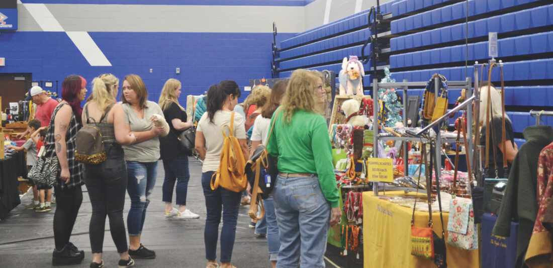 Artisans, patrons march into Warren High School for band benefit | News ...